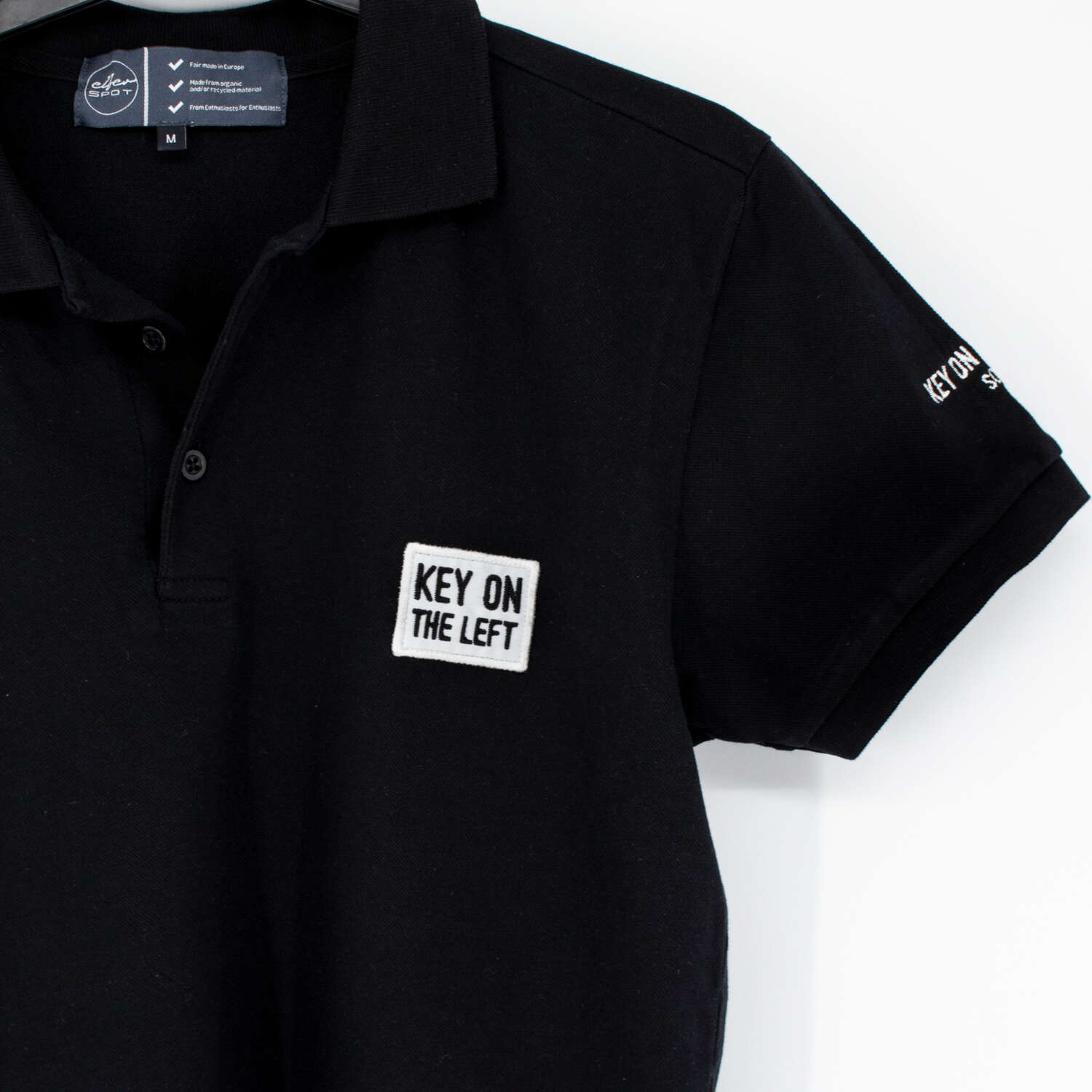 Polo Shirt Key on the left Schwarz - Driver's Collection - Elferspot Shop